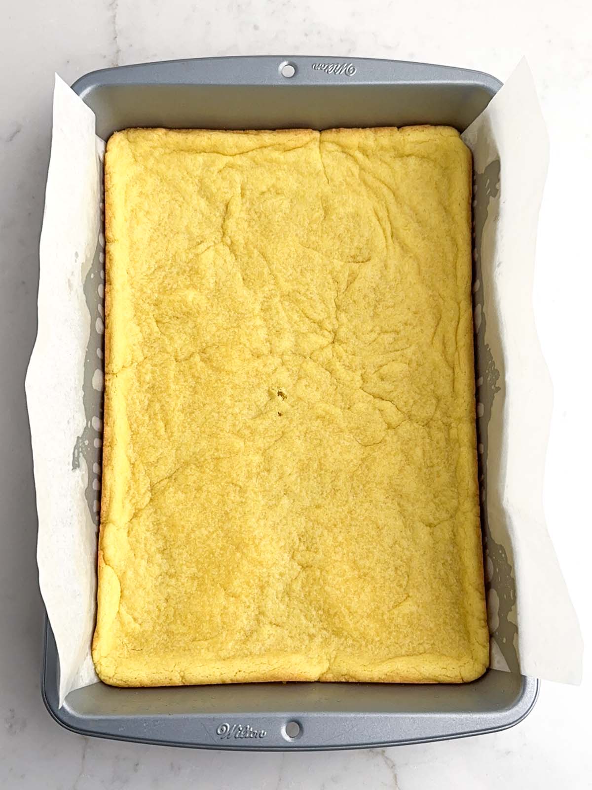 Lemon Cake Mix Bars with Cream Cheese Frosting - Midwestern Holidays